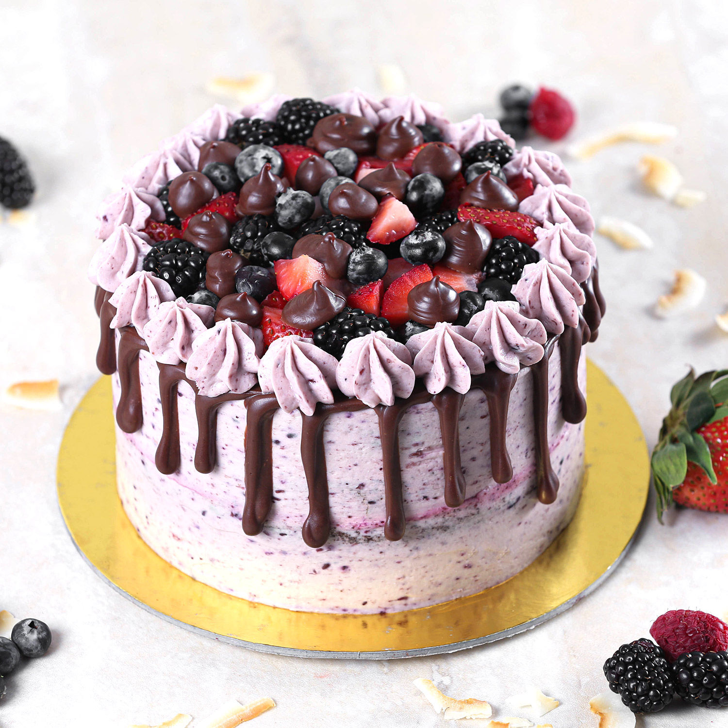 Online Delicious Chocolate Berry Cake Half Kg Gift Delivery in Oman - FNP